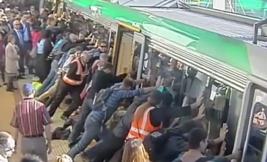 Commuters Use People Power to Push Train Off Trapped Man - Good News ...
