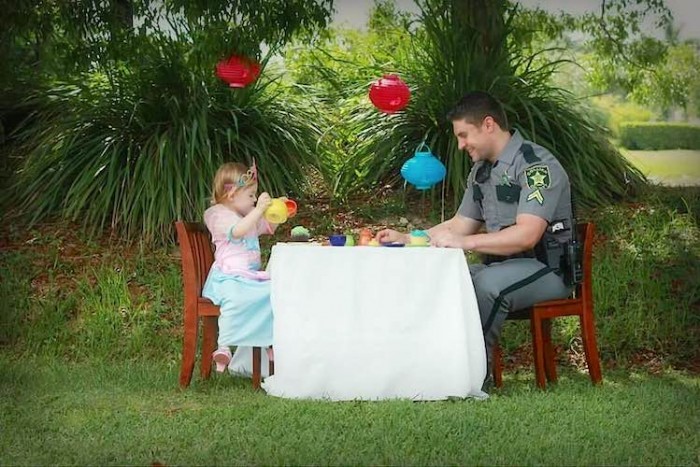 This Cop and Daughter’s Sweet Tea Party is Melting Hearts Everywhere
