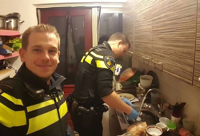 Two Cops Do Their Duty By Doing The Dishes When It Counts Most