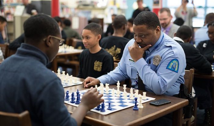 Inner City Cops Help Underserved Kids by Playing Chess - Good News Network