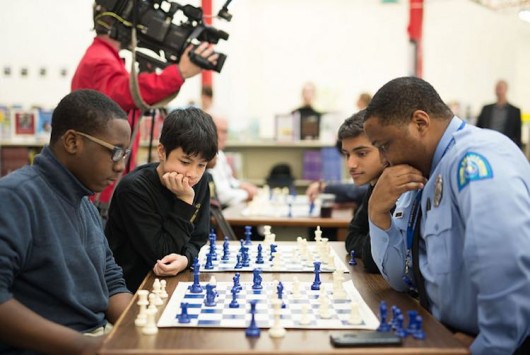 Inner City Cops Help Underserved Kids by Playing Chess - Good News Network
