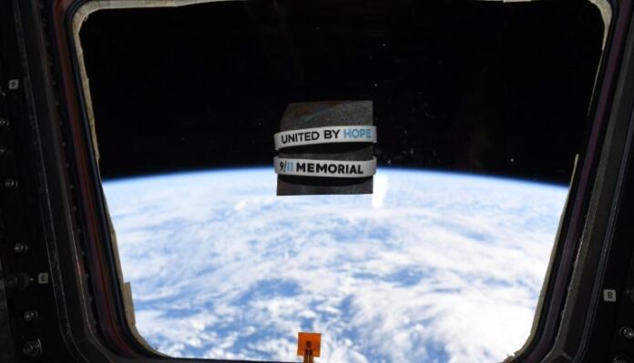 Astronaut Brings Ashes and Photos of 9/11 Victim to Space to Fulfill ...