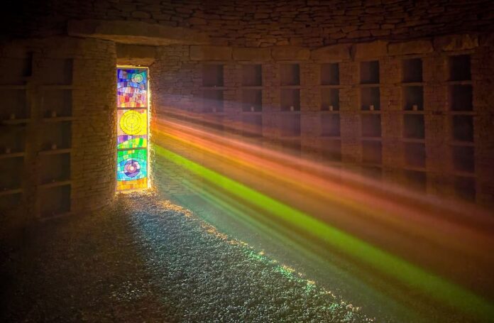 Solstice Sunbeam Through Stained Glass Window of Neolithic Burial Room ...