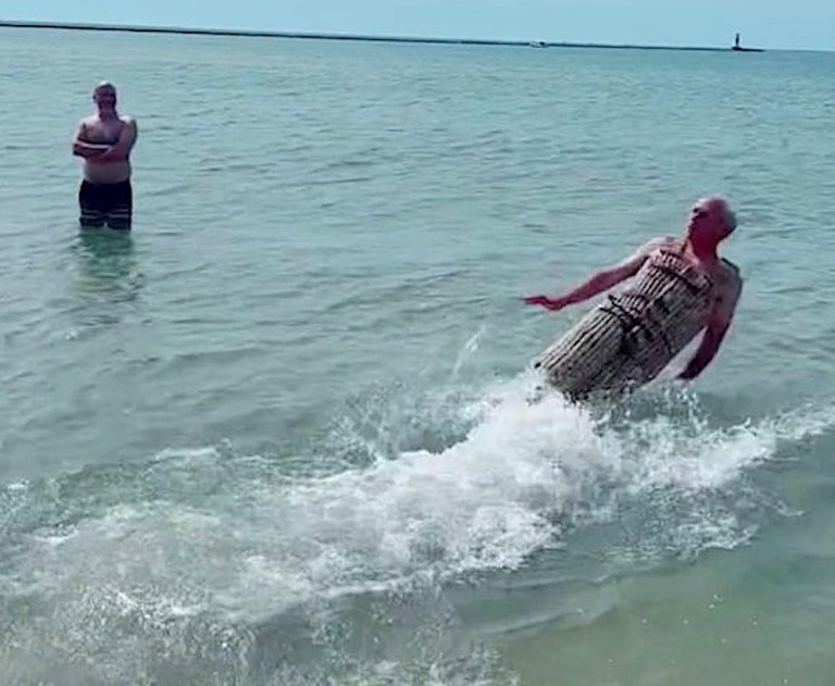 Watch Stepdad Finally Launch His Floating Suit Made of 1,100 Corks ...