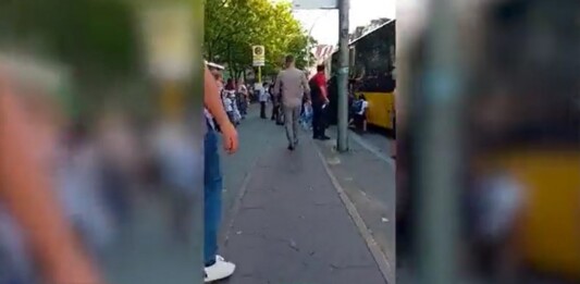 40 ‘Heroes’ Lift a Berlin City Bus Off Trapped Young Man–(WATCH)