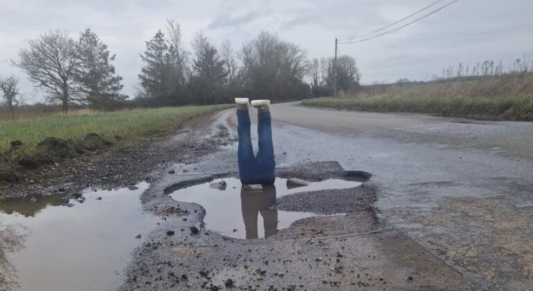 Pothole Prank: Man Erects Fake Legs in the Road and the Neglected Hole ...