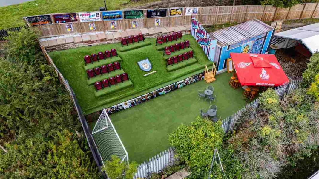 Soccer-Mad Pub Owner Turns Bar's Garden into Mini Stadium Bedecked in ...